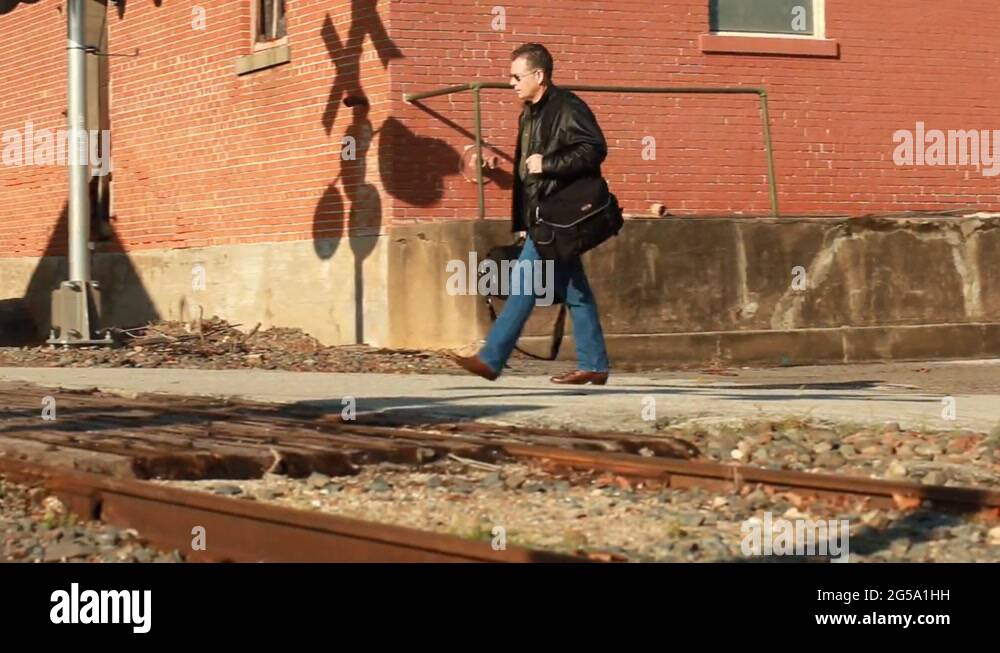 Walking across railway tracks Stock Videos & Footage - HD and 4K Video ...