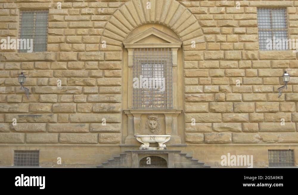 A lion head sculpture on a building facade Stock Video Footage - Alamy