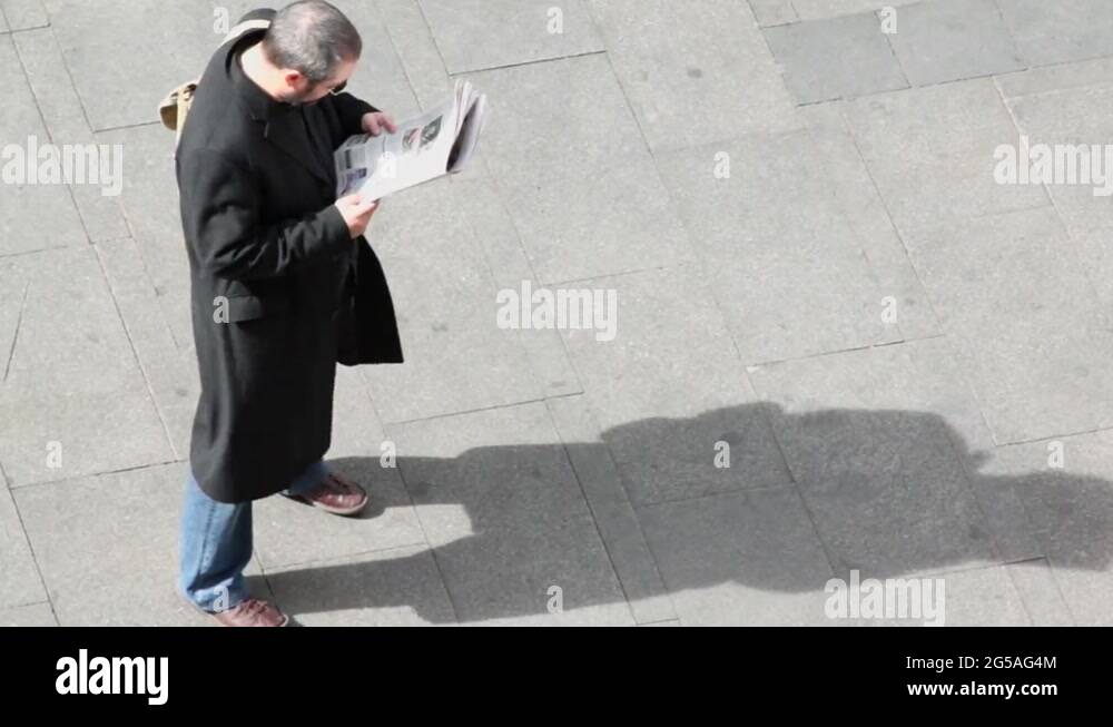 Paper on pavement Stock Videos & Footage - HD and 4K Video Clips - Alamy