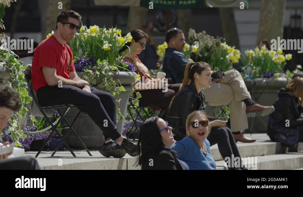 People sitting down and relaxing Stock Video Footage - Alamy