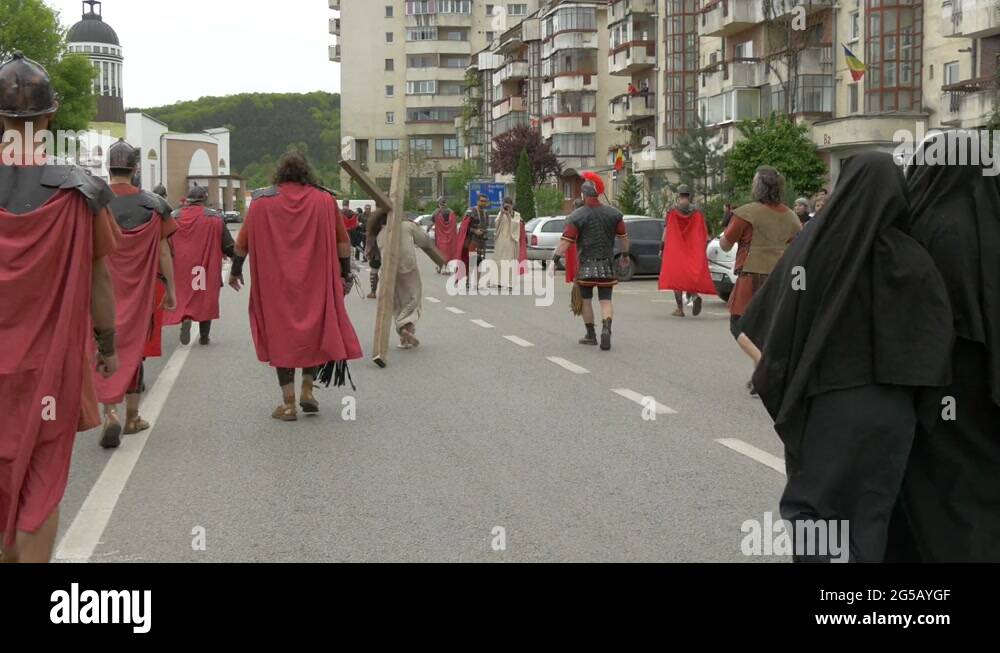 Jesus carrying the heavy cross Stock Video Footage - Alamy