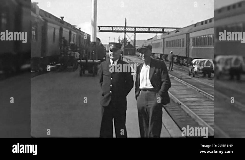 1930s Train Conductor in Rail Yard Train Station Vintage Old Film Home ...