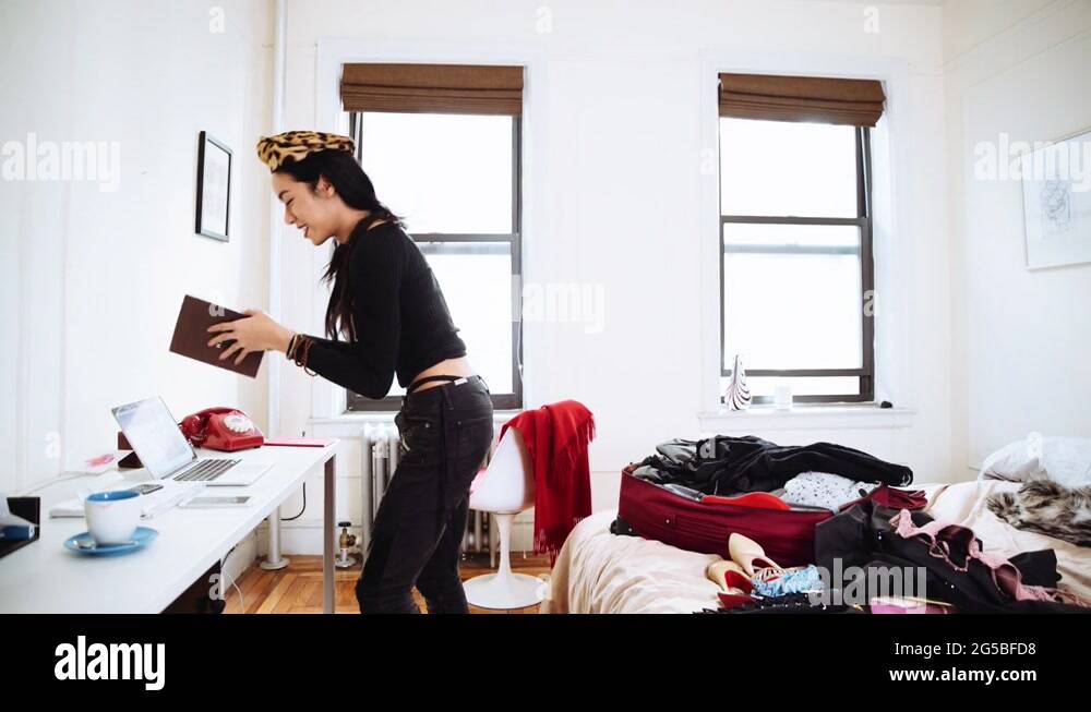 Thai transgender woman packing and preparing for travel Stock Video ...