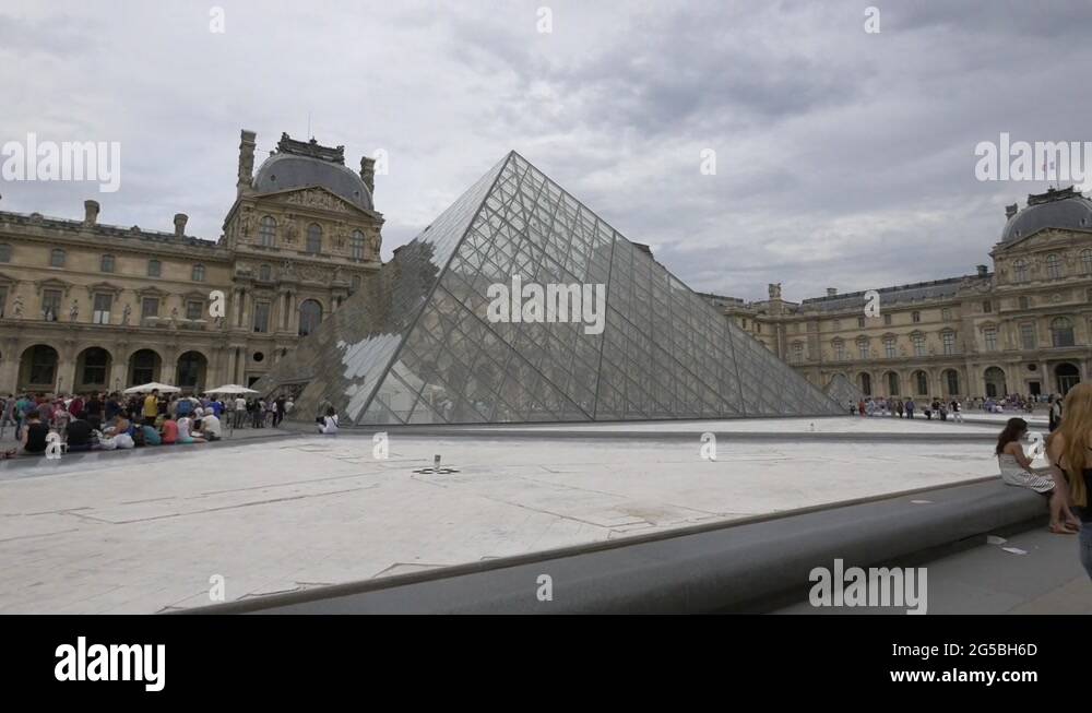The Louvre Pyramid in the Napoleon Courtyard Stock Video Footage - Alamy
