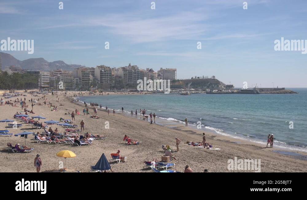Benidorm beach sunbathing Stock Videos & Footage - HD and 4K Video ...
