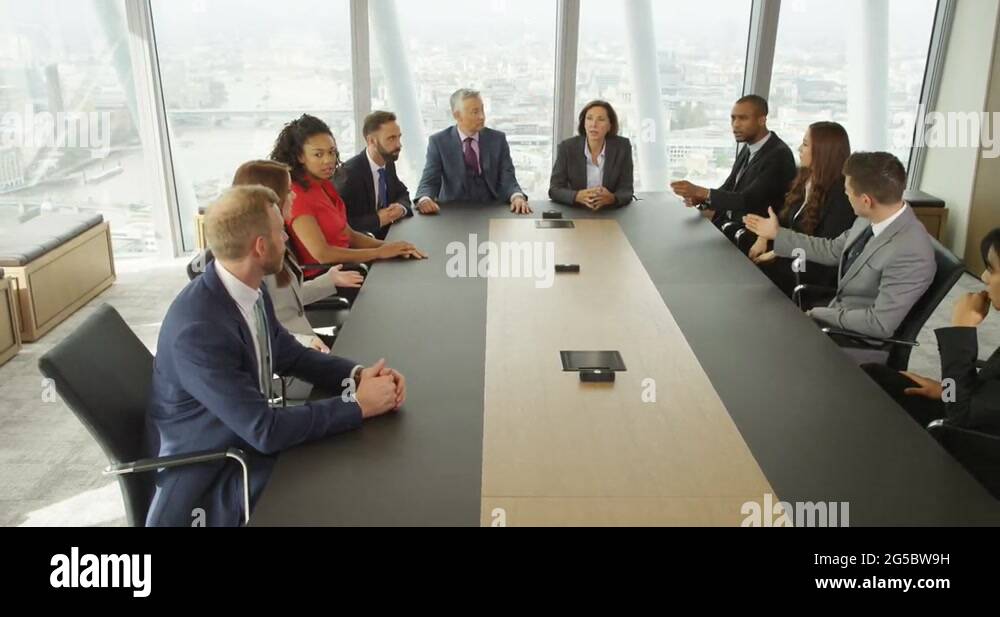 Executives sitting around conference table Stock Videos & Footage - HD ...