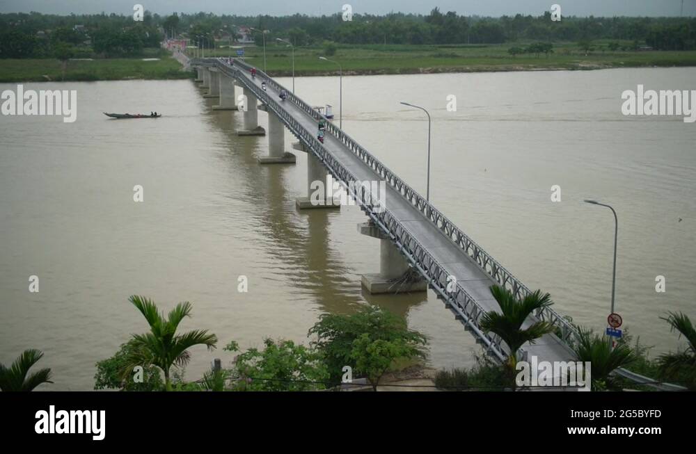 Mopeds Pass Over a Narrow Bridge in Hoi An Vietnam Stock Video Footage ...