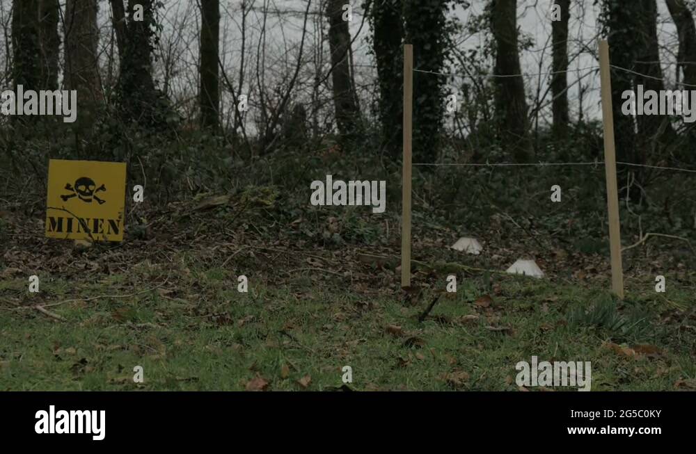 WW2 german minefield with mine warning sign Stock Video Footage - Alamy