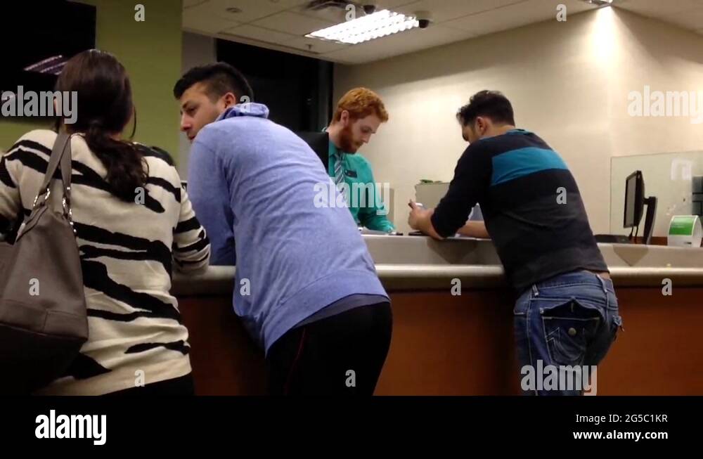 People at counter Stock Videos & Footage - HD and 4K Video Clips - Alamy