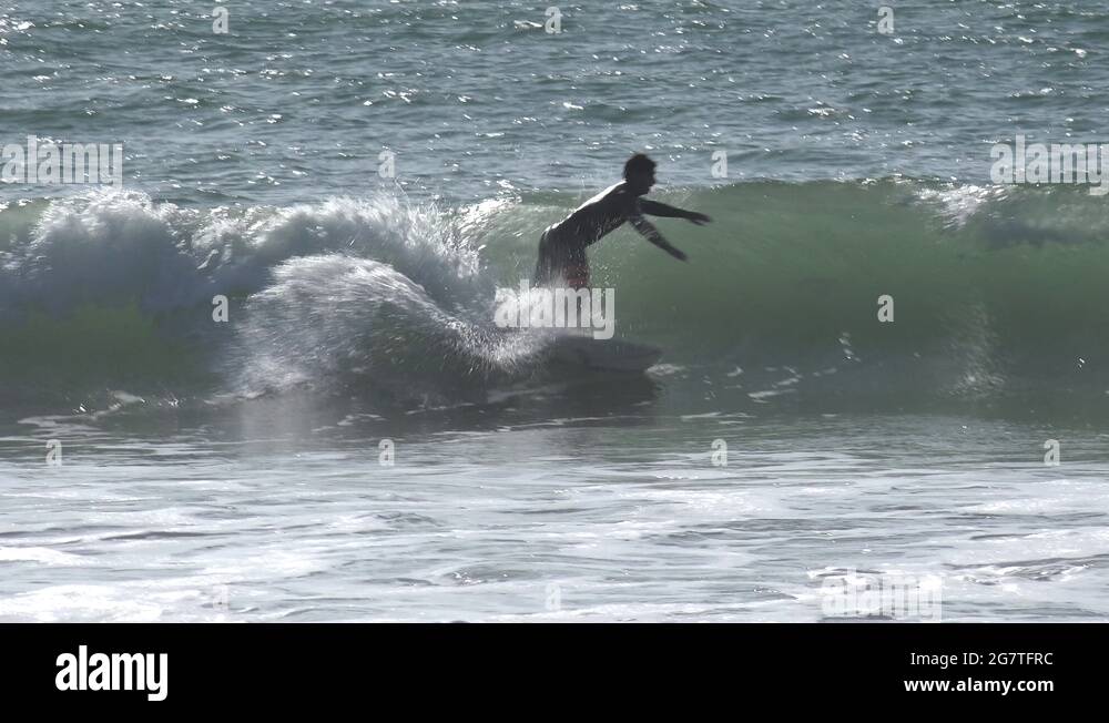Boy surfing waves Stock Videos & Footage - HD and 4K Video Clips - Alamy