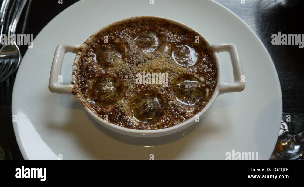 Escargot restaurant Stock Videos & Footage - HD and 4K Video Clips - Alamy