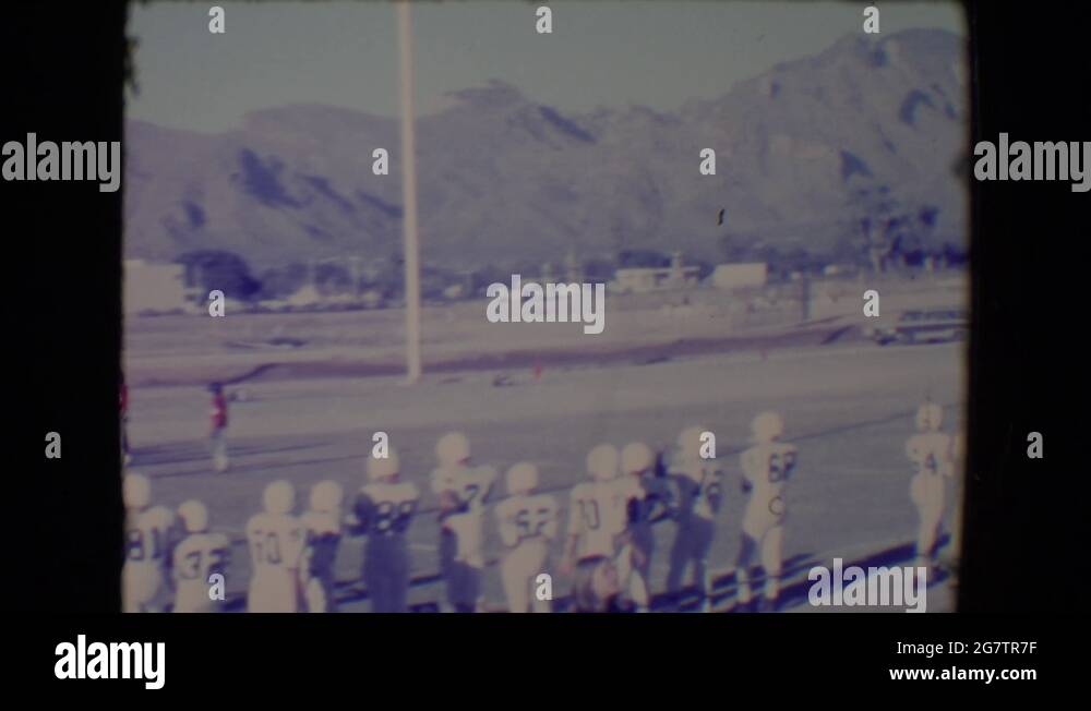 TUCSON ARIZONA USA-1967: Football Team Wearing White Uniforms Lineup On ...