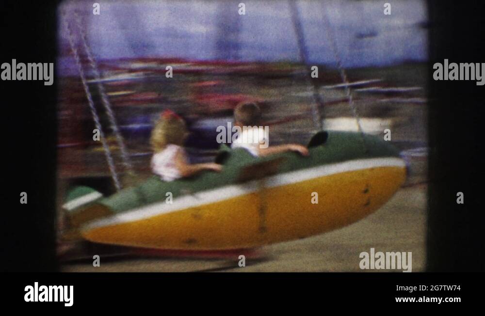 KANSAS CITY MISSOURI-1959: Male And Female Riding Airplane Ride At ...