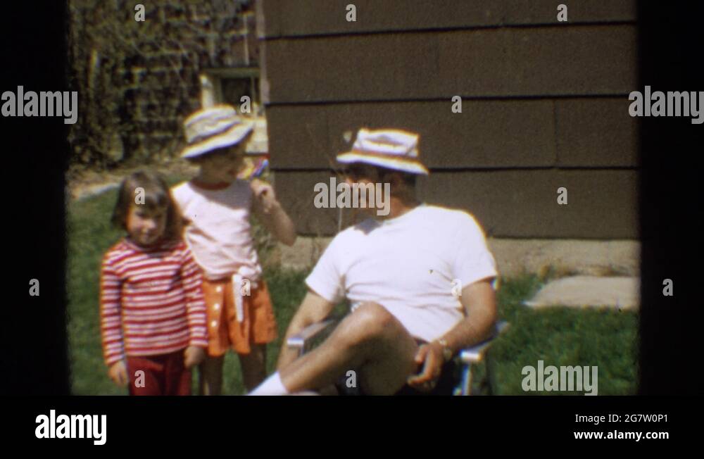 ARIZONA-1959: Man Sitting In Lawn Chair Outside Talking To Two Young ...