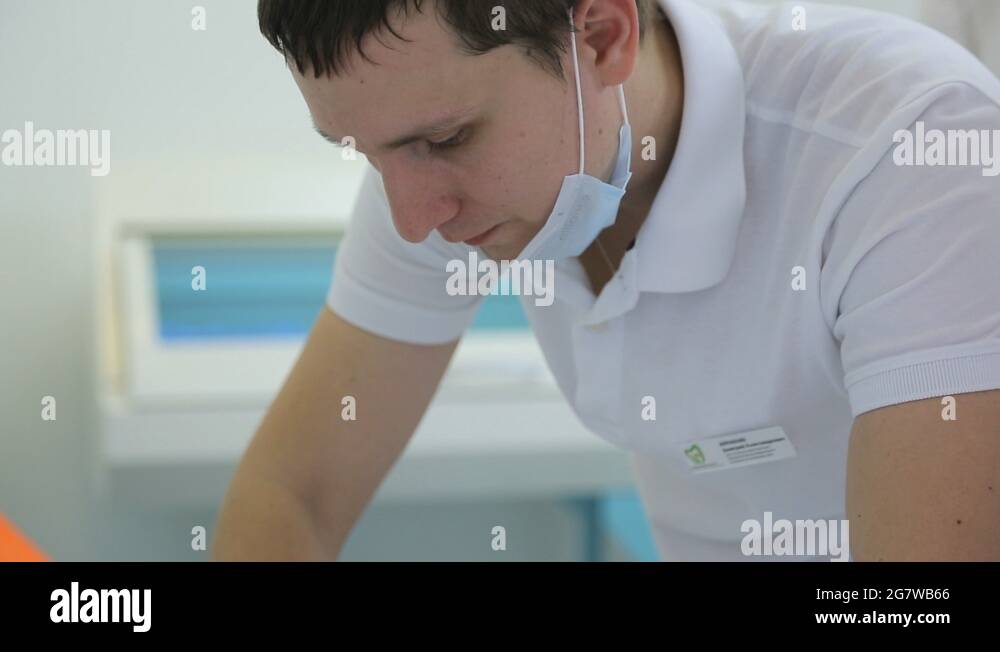 Doctor enters data in memory of computer in working cabinet Stock Video ...