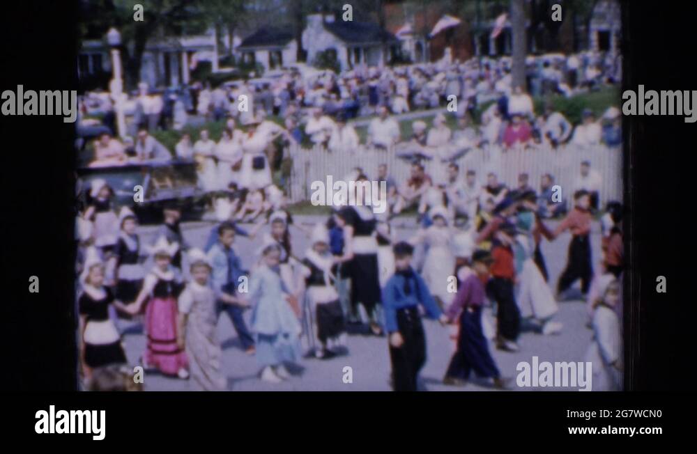 IOWA USA-1959: Women And Children In Traditional Dress Walking And ...