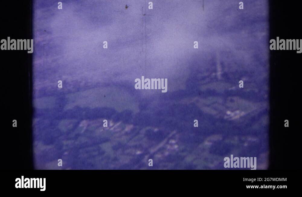 LONDON ENGLAND-1963: Aerial View Of A Small Town With Many Trees Cars ...
