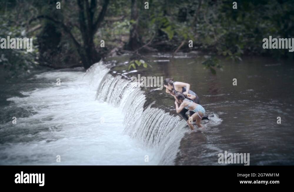 Jumping into waterfall Stock Videos & Footage - HD and 4K Video Clips ...