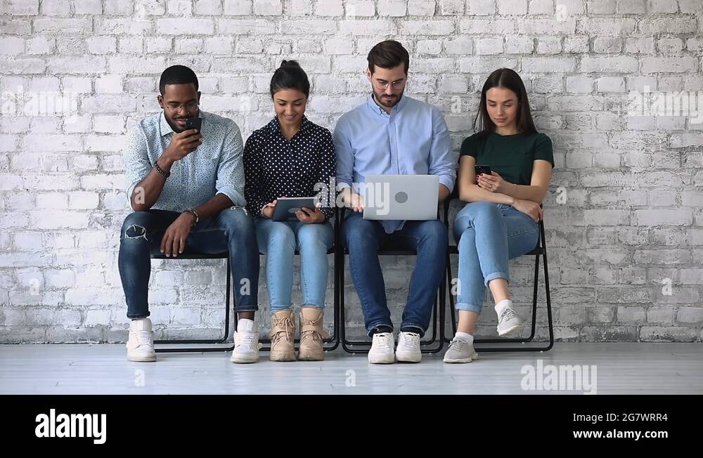 Row of people sitting on chairs Stock Videos & Footage - HD and 4K ...