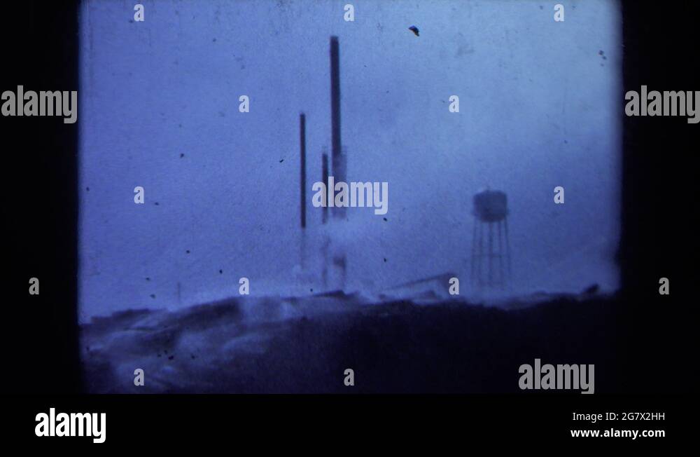 MAINE USA-1971: A Grainy Dark Video Showing A Water Tower And Some ...