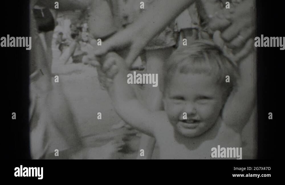 NEW YORK-1947: A Man Making Something For His Baby Several Kids Are ...