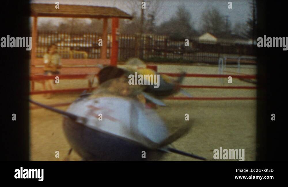 LOS ANGELES CALIFORNIA-1961: Two Kids Ride In Airplane Amusement Park ...