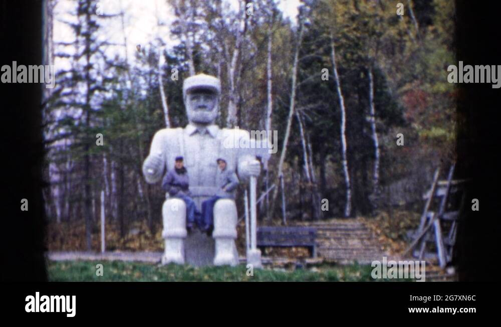 MICHIGAN USA-1960: People Sitting On Int Statue While Wiring Air ...