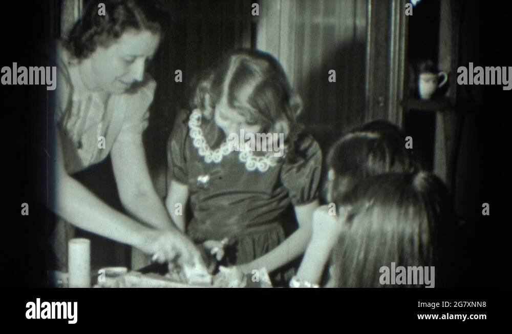 WEST GERMANY-1951: Excited Girl Opening A Small Box With Her Family ...
