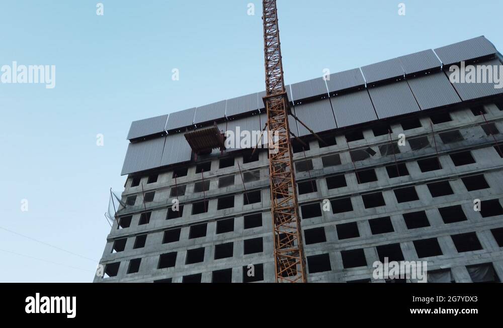 Construction of a high-rise tower of a residential building Stock Video ...