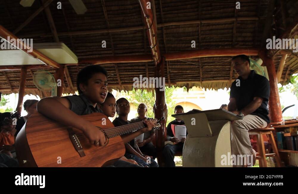 Kids Playing Guitar on the Micronesian island of Palau Stock Video ...