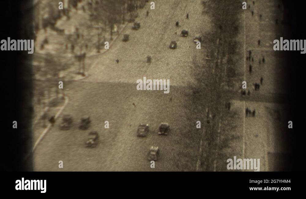 PARIS FRANCE-1947: A Busy Urban Street Lined With Trees And Massive ...