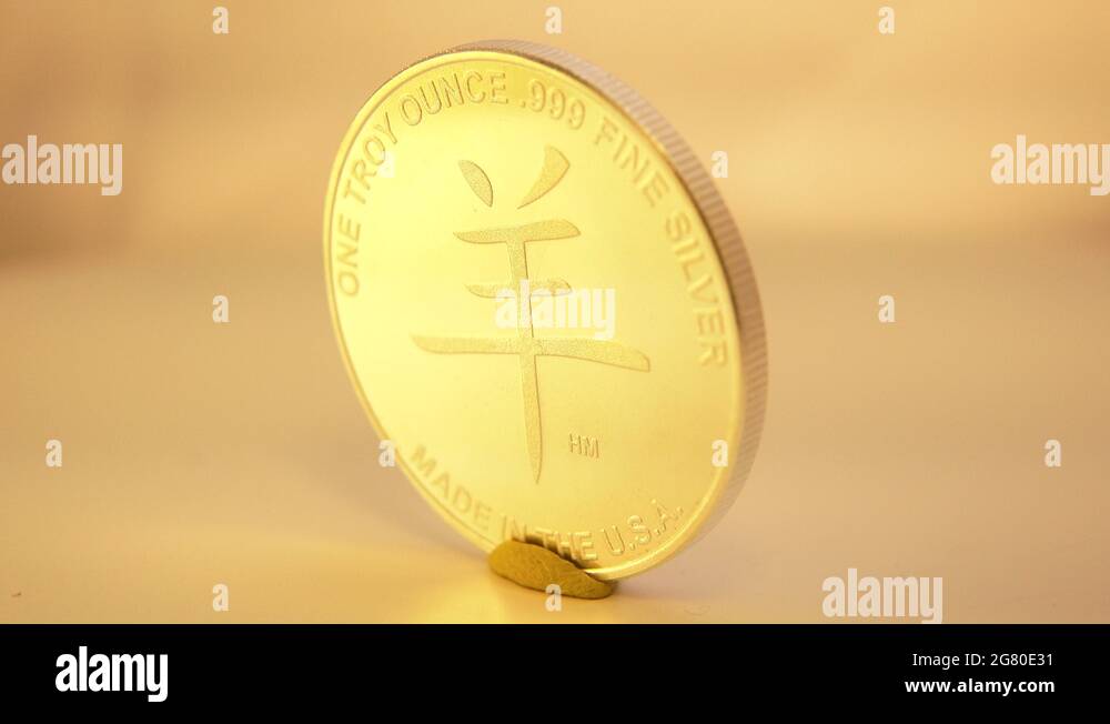 Gold Coin Turns Around And Around Stock Video Footage - Alamy