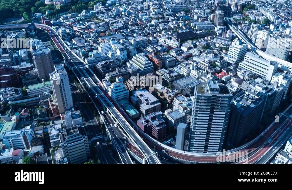 Day becomes night over a massive highway intersection in Tokyo, Japan ...