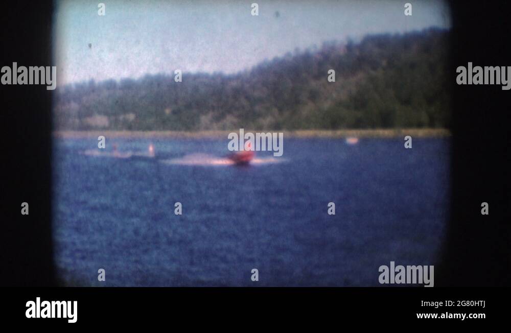 SOUTH DAKOTA-1954: A Red Speed Boat Moving Fast Through The Water ...