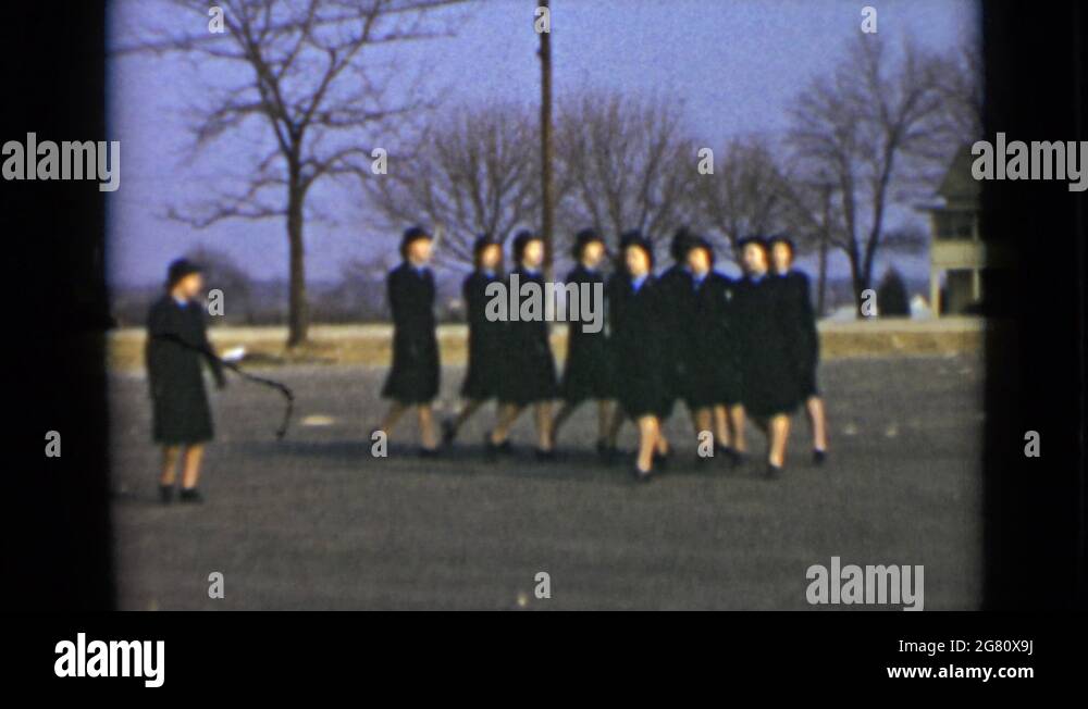 NEW YORK-1947: Group Of Women Wearing Black Uniforms Marching In ...