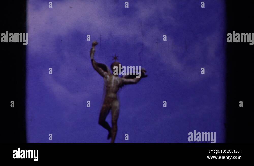 PARIS FRANCE-1939: Shakey Statue Man With Wings In Blue Sky With Clouds ...