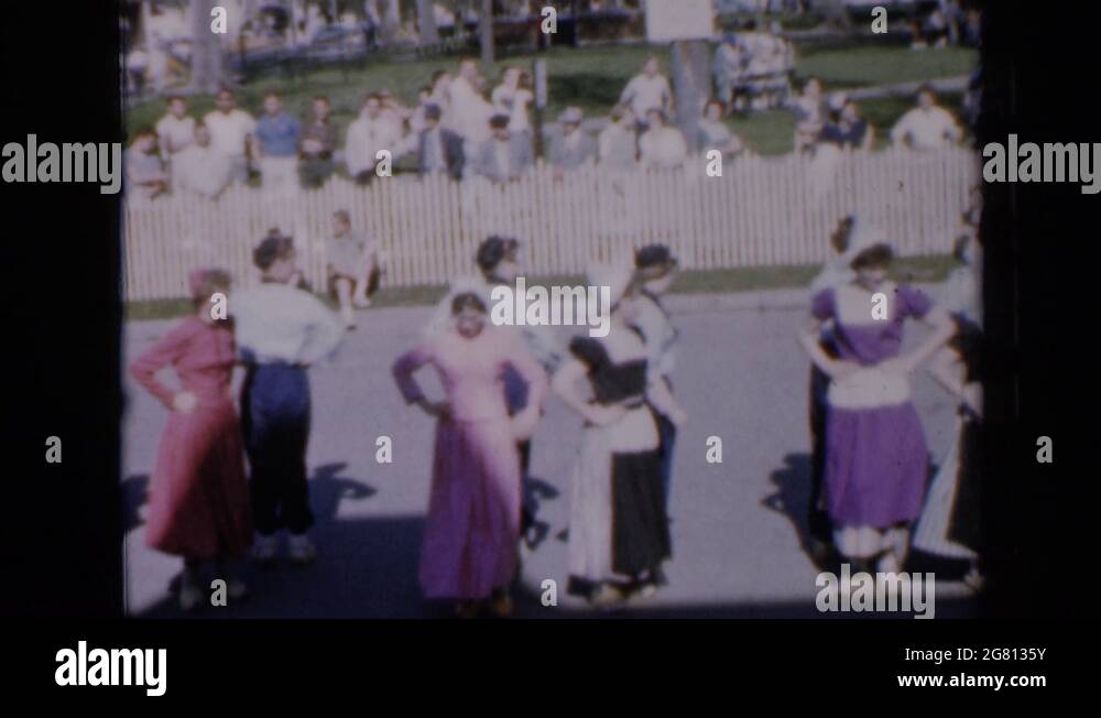IOWA USA-1959: Several Women In Traditional Dress Dance In A Line ...
