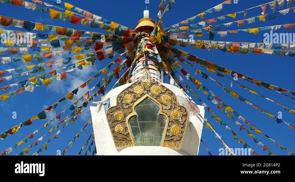 4k buddhist white stupa & flying prayer flags in shangrila yunnan,china ...