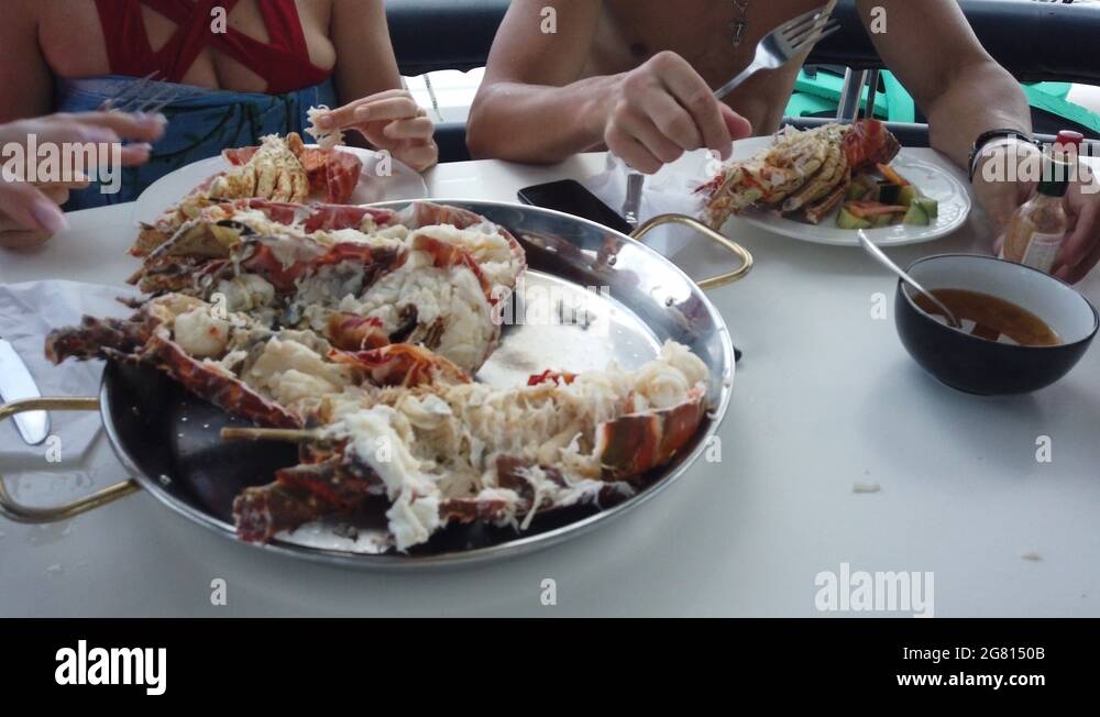 Just cooked a fresh lobster. People eat lobster on the boat. Rocking ...