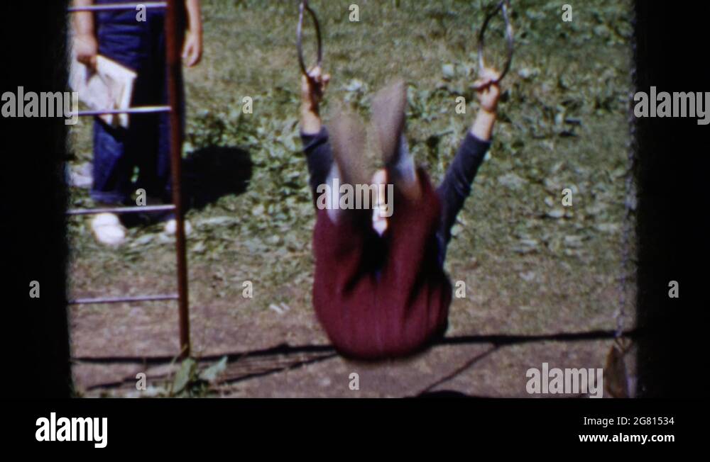 NEW YORK-1951: Child Showing Off Mid-Air Front Roll Using Rings At A ...