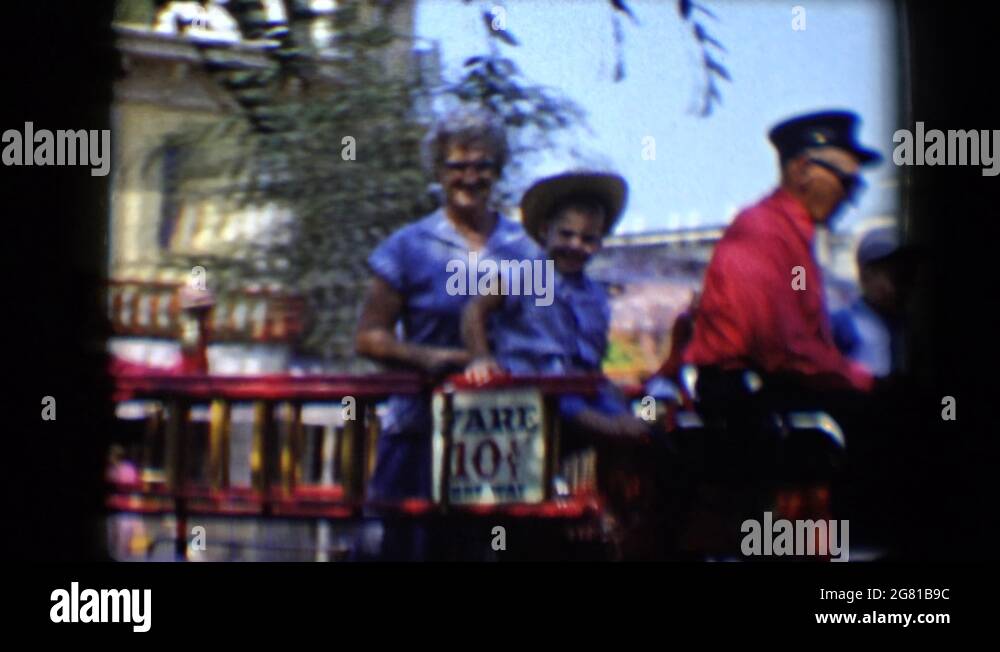 DISNEYLAND CALIFORNIA-1959: Family On Carnival Fire Truck Ride Stock ...