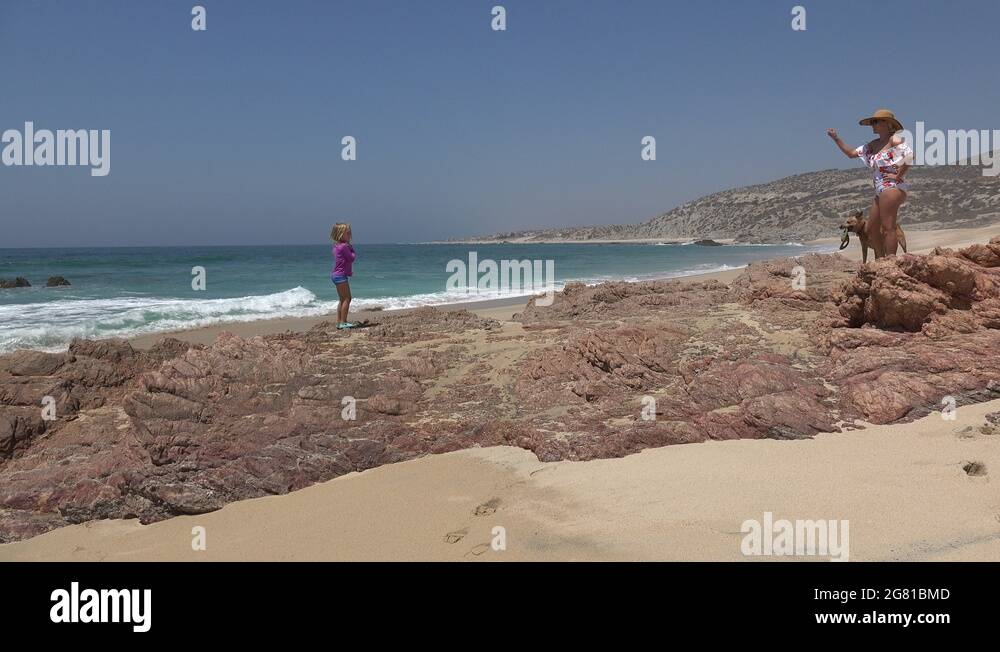 CABO SAN LUCAS MEXICO-2019: Child Running Toward Mother And Dog On ...
