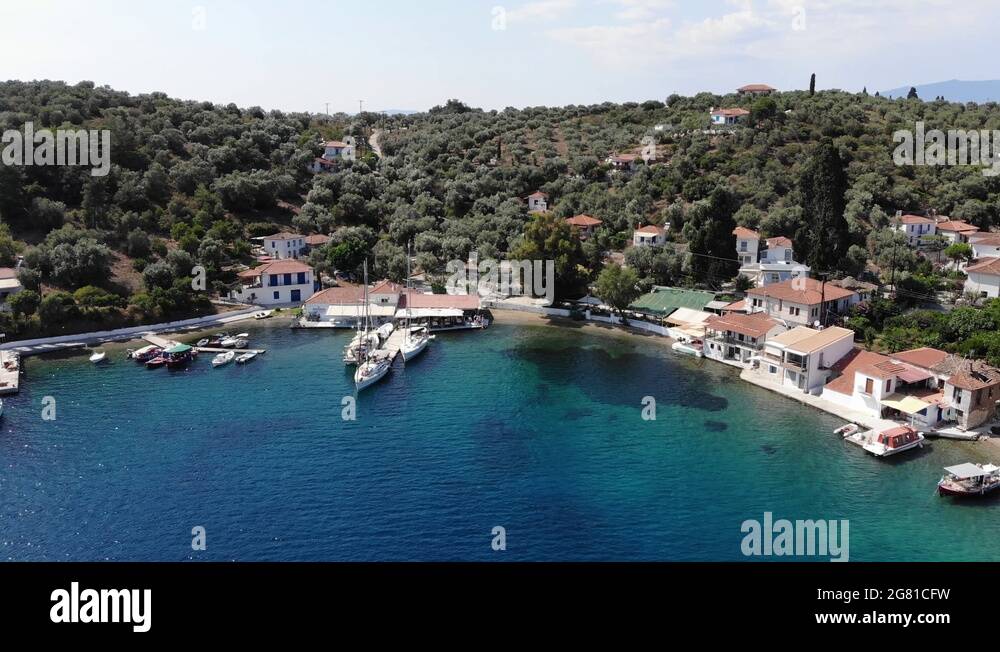 Flight over the harbour from Paleo Trikeri, Island Pangias, Strait of ...