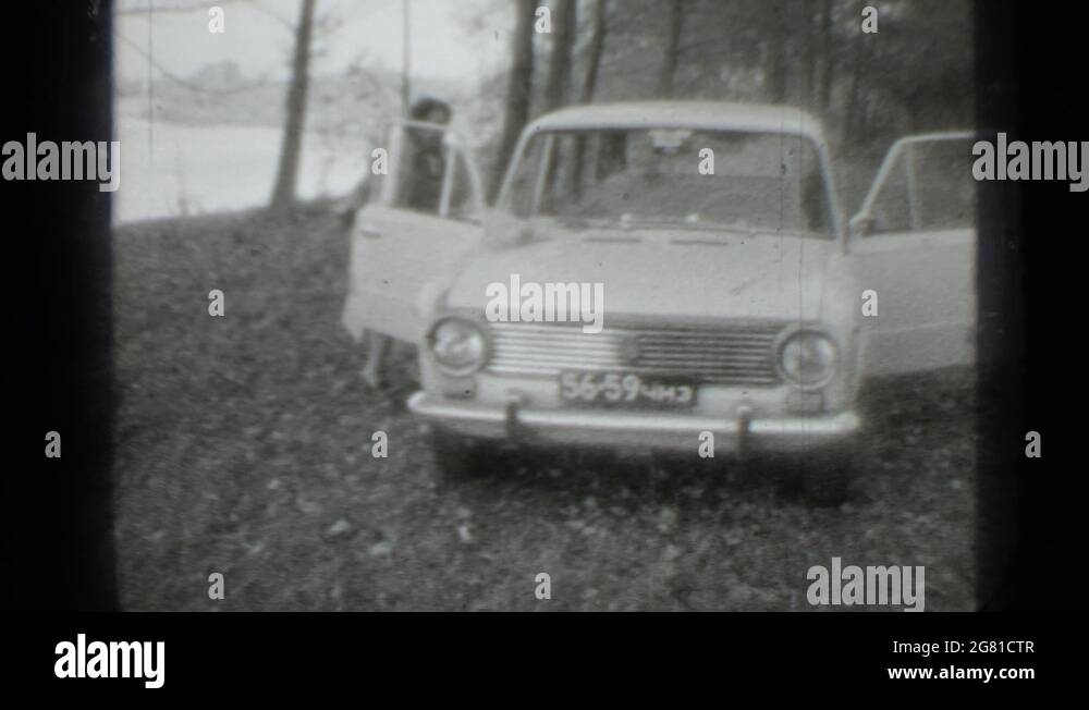 MOSCOW RUSSIA-1975: Couple Going On A Picnic In The Vintage Car Near A ...