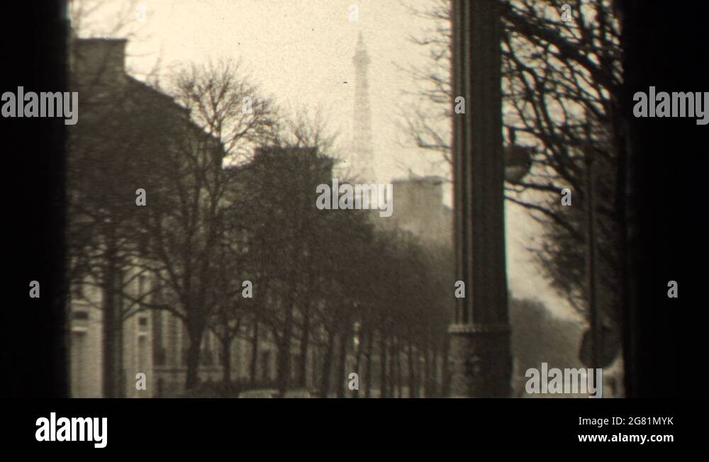 PARIS FRANCE-1947: Black And White Parisian Street With Eiffel Tower On ...