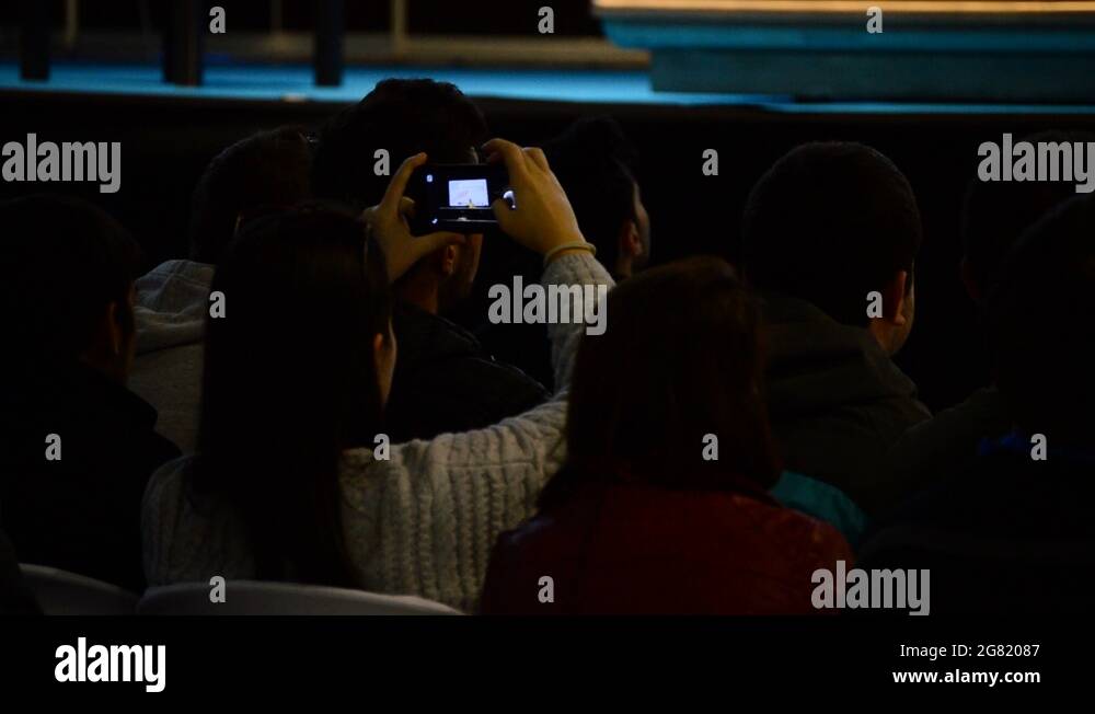 Different people sitting as a public event indoor Stock Video Footage ...