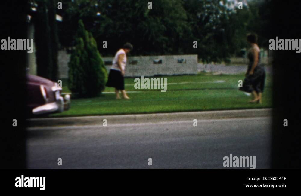NORMAL ILLINOIS USA-1957: Two Women On In Front Yard One Older Male ...