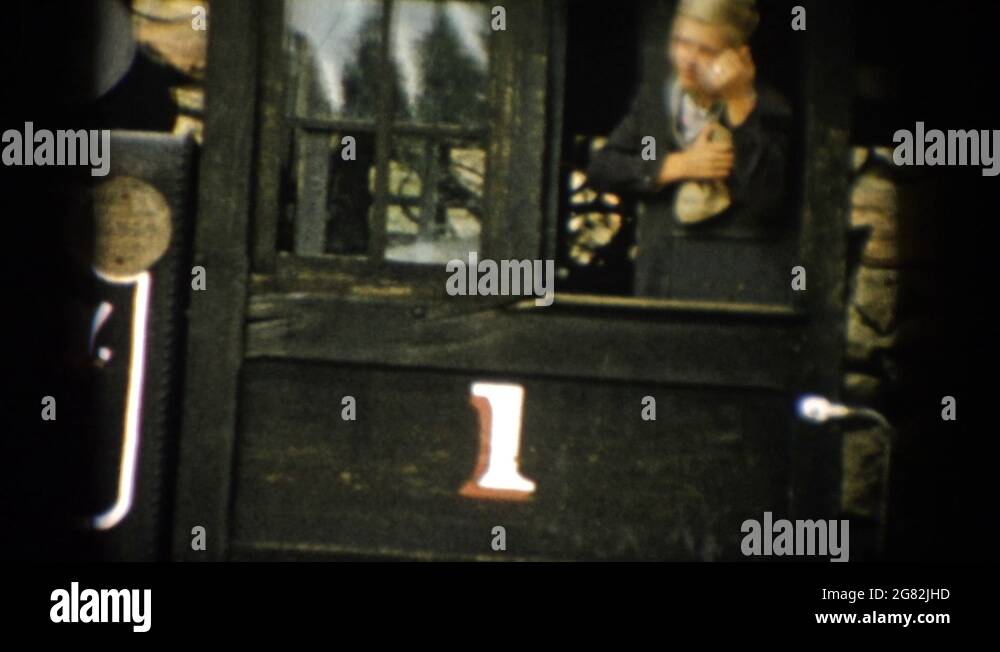 COLORADO USA-1959: Man Standing Wiping Face In Window With Number One ...