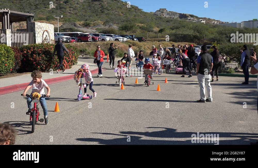 CABO SAN LUCAS MEXICO-2020: Kids Ride Bikes And Scooters Through An ...