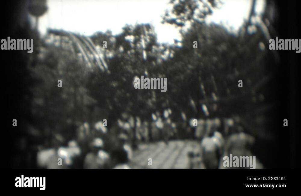 WASHINGTON DC-1975: Rollercoaster Running At An Amusement Park Full Of ...